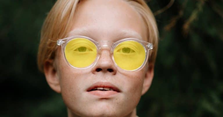 Why Are Some Lenses Tinted Yellow?